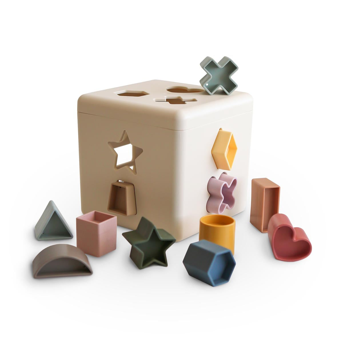 Fun and colorful shape sorting box toy from Mushie!